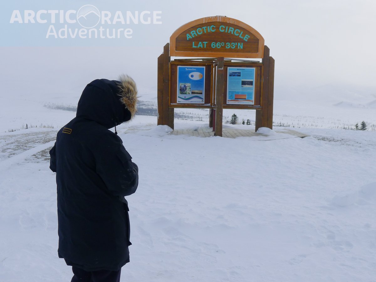 The Arctic Circle Sign on the Dempster Highway | Arctic Range Adventure