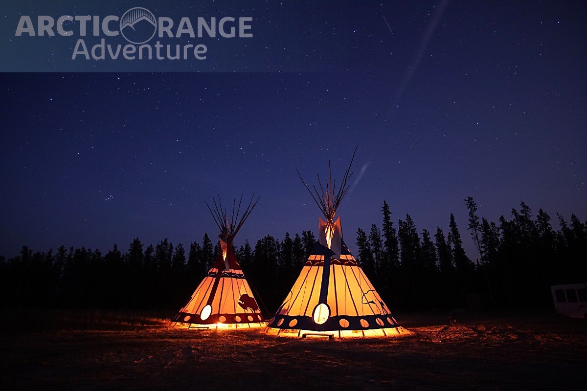 Tipis under the clear night sky | Arctic Range Adventure