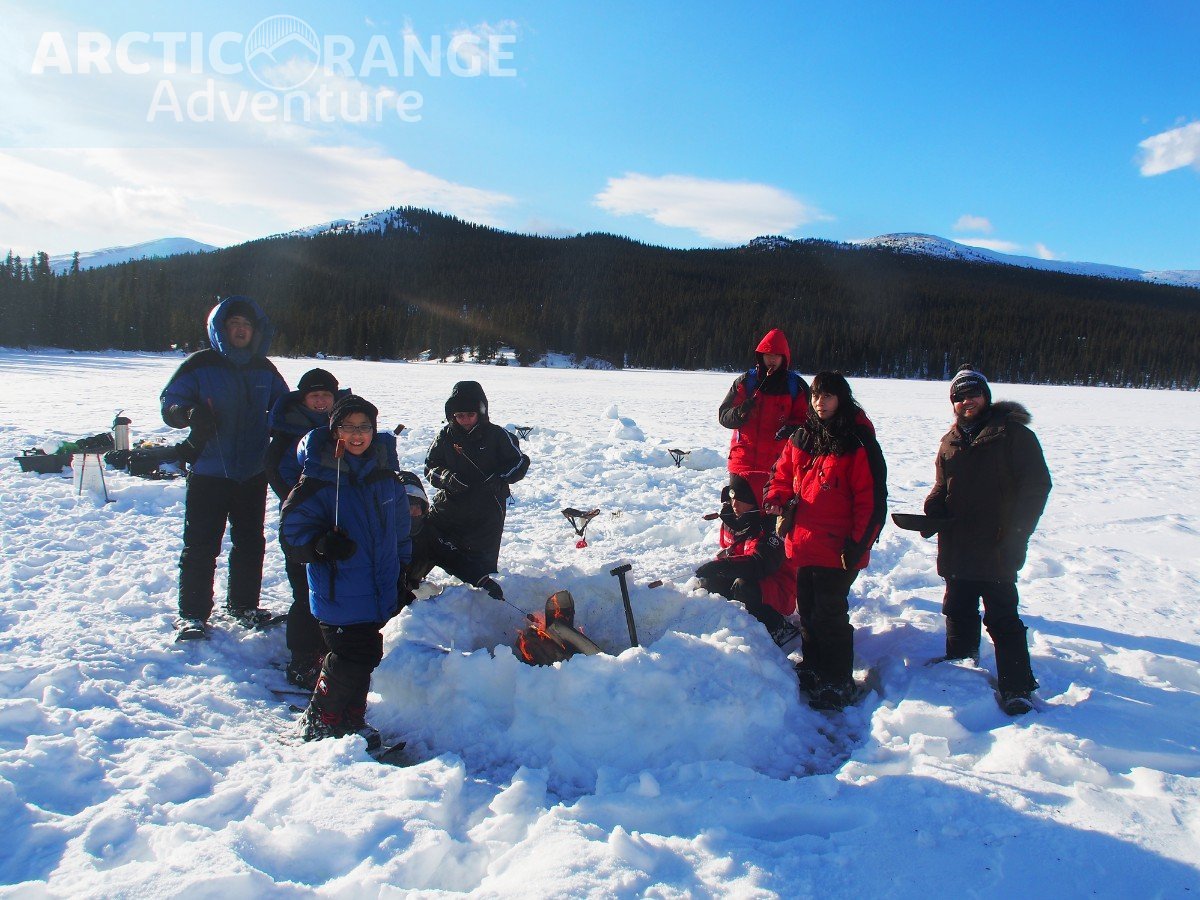 Group enjoying the campfire | Arctic Range Adventure