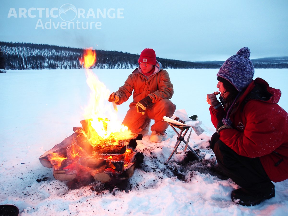 Campfire on the frozen lake | Arctic Range Adventure