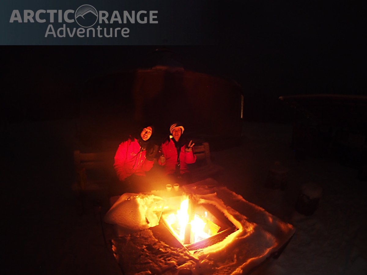 Enjoying the campfire under the night sky | Arctic Range Adventure